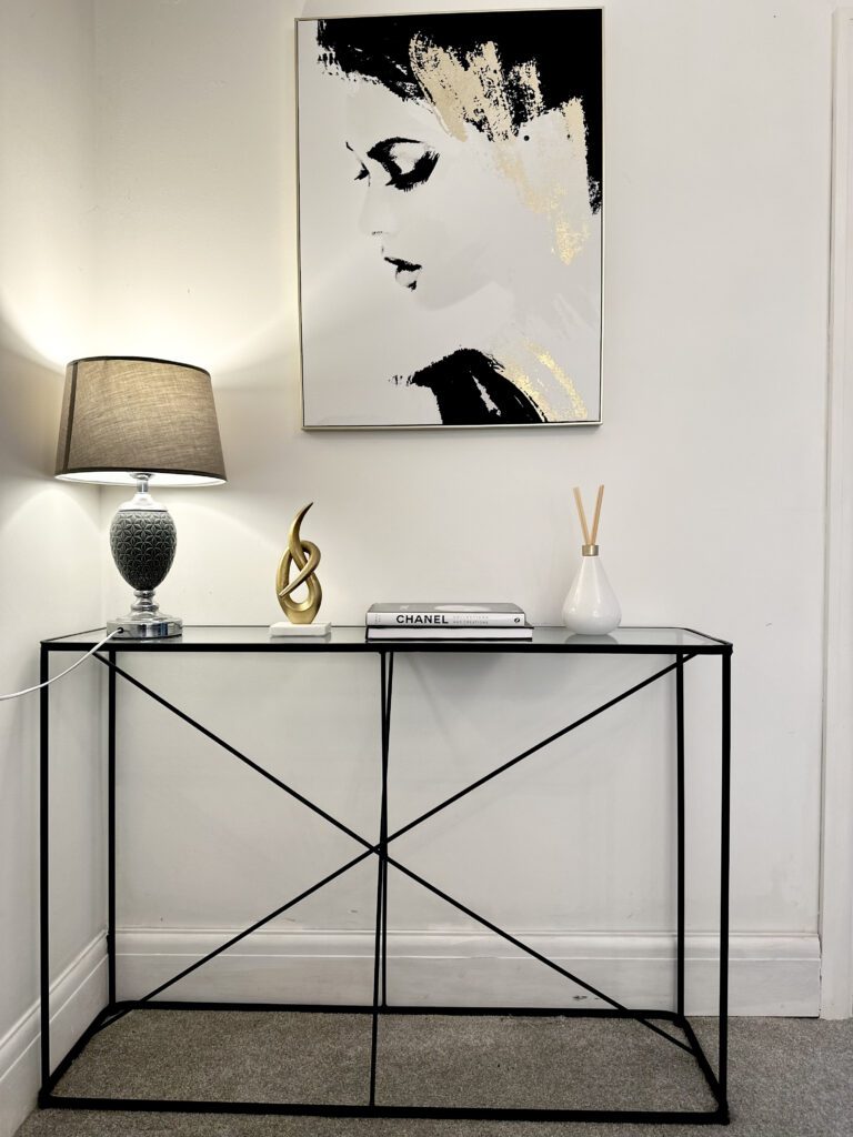 The Console Table I Never Knew I Needed: Roxy Glass & Black Metal